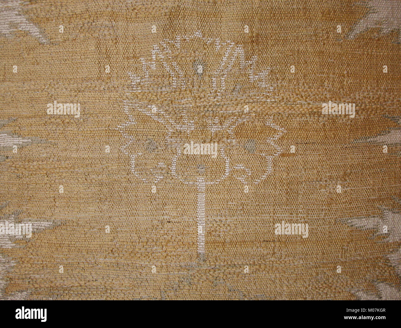 A kaftan, a traditional garment, made of rich fabric with intricate ...