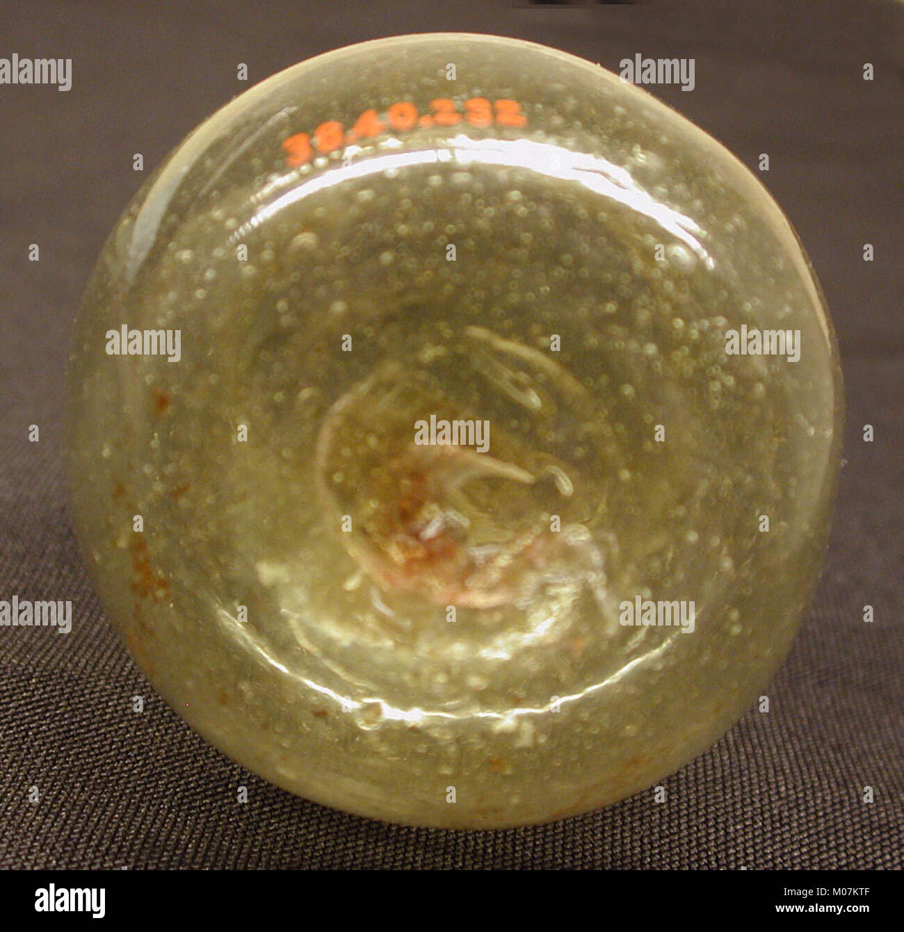 This miniature glass bottle features intricate design and craftsmanship ...