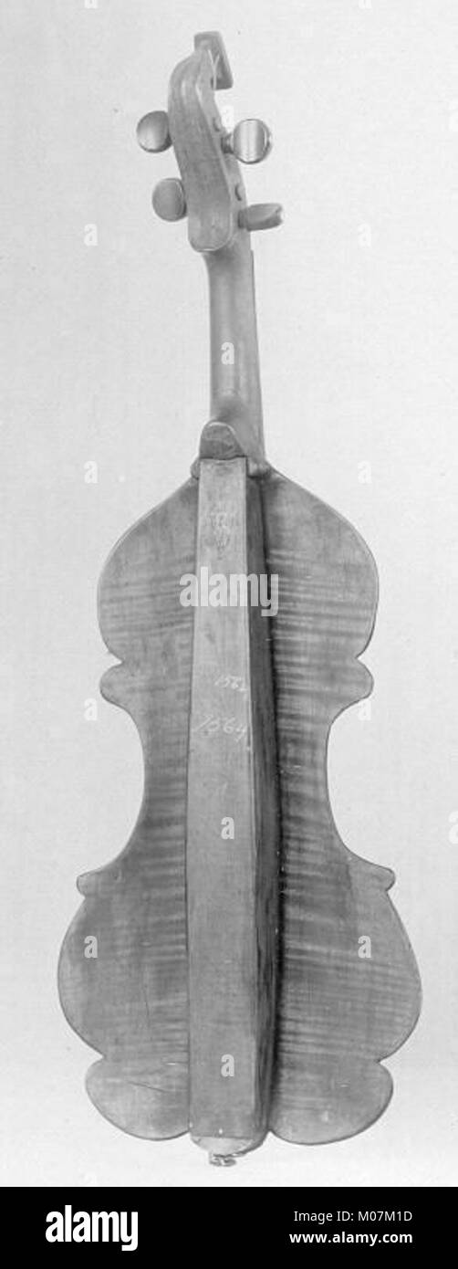 This mute violin, an example of period musical instruments, represents ...