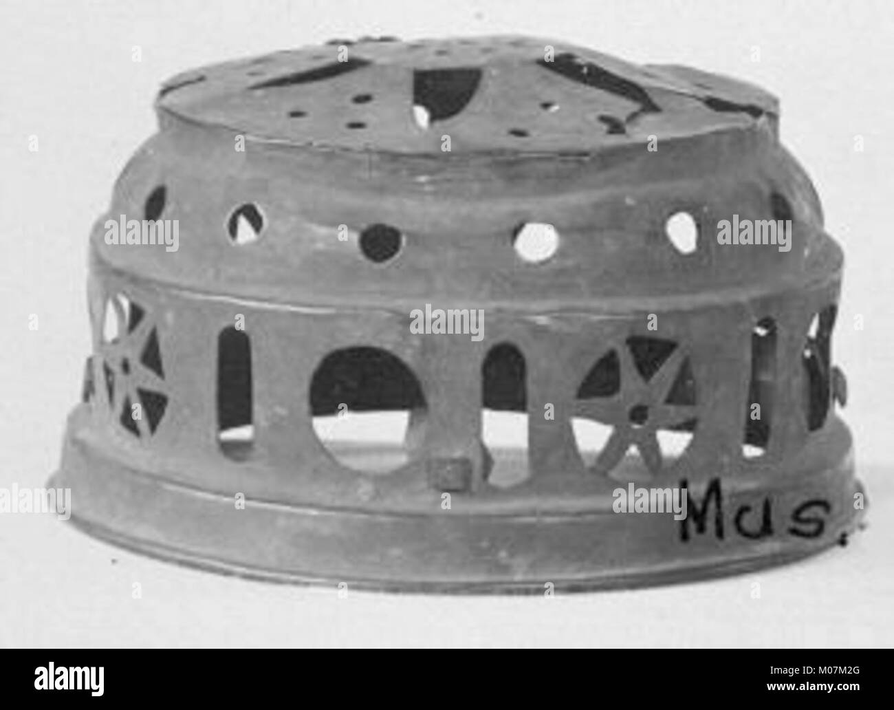 The mass bell is an ecclesiastical object illustrating religious ...