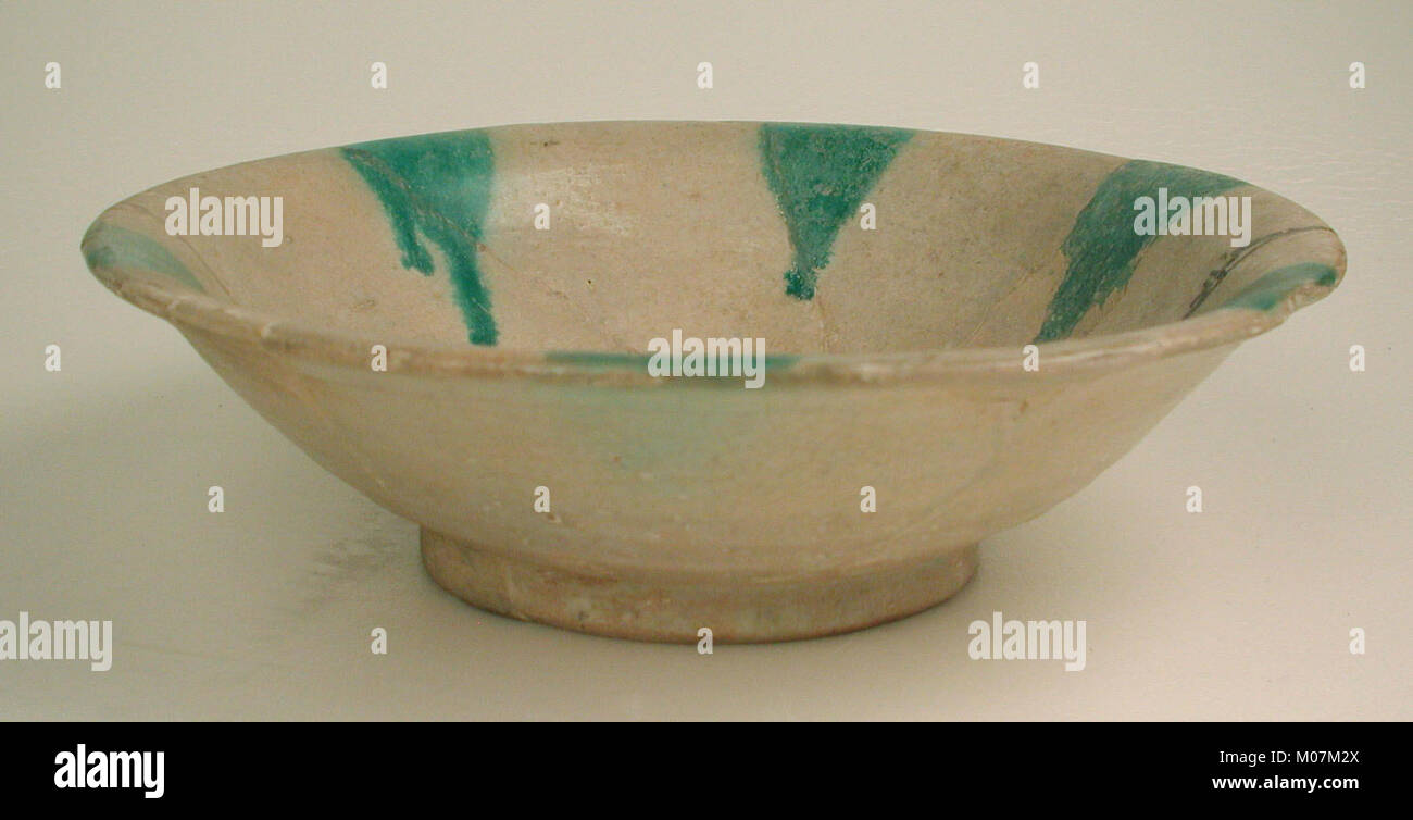 This imitation Samarra ware features green splashes, reflecting Islamic ...
