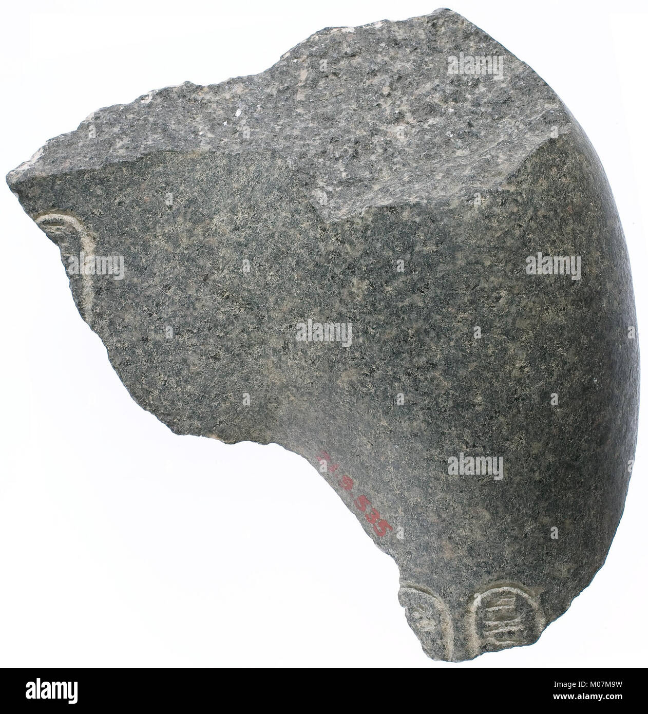 This fragment depicts the left shoulder and chest of an ancient ...