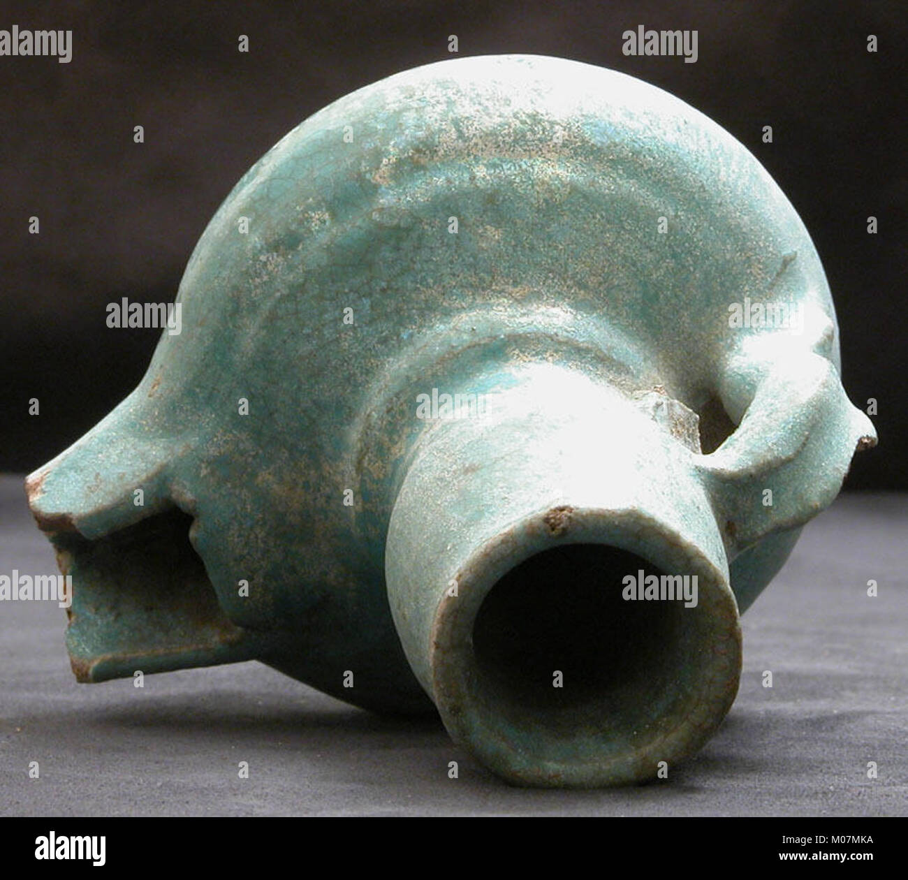 This lamp is a representative example of its period, offering both a ...