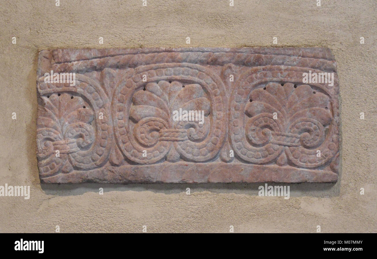 This lintel, likely from a doorway or entrance, features intricate ...