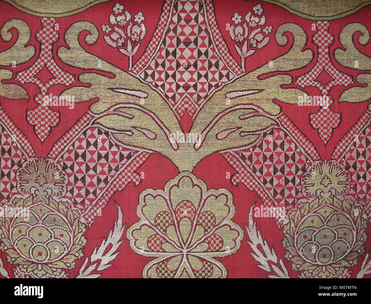 Loom-width textile with floral and tiger-stripe patterns, illustrating ...