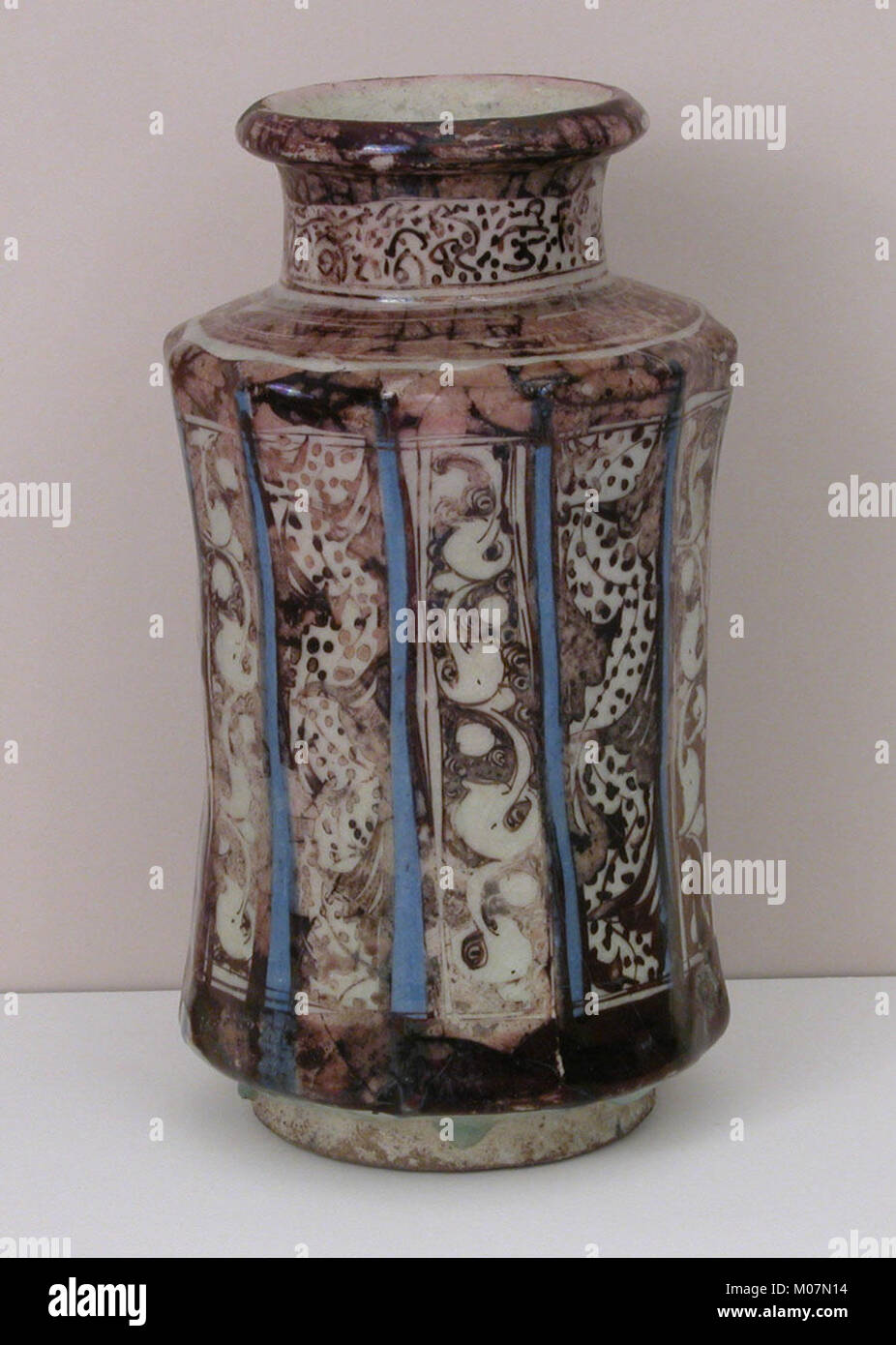 This jar, an example of early pottery, features a simple yet functional ...