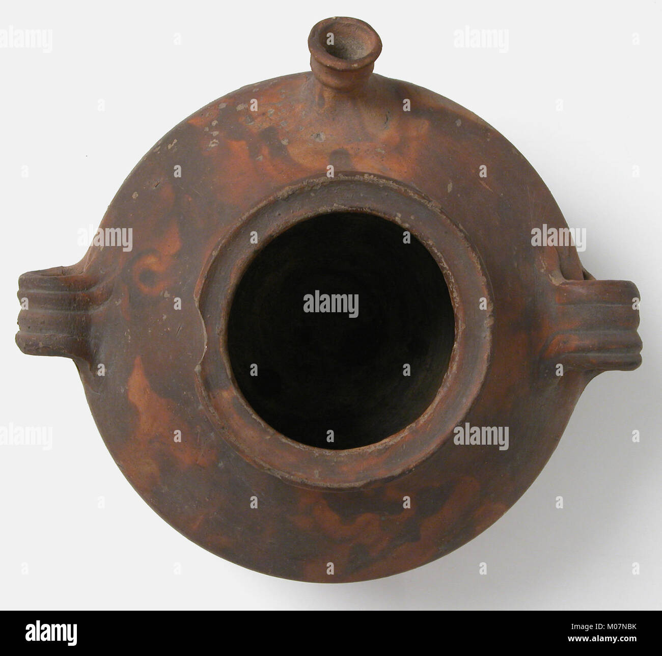 This jug is an example of ancient pottery, showcasing detailed ...