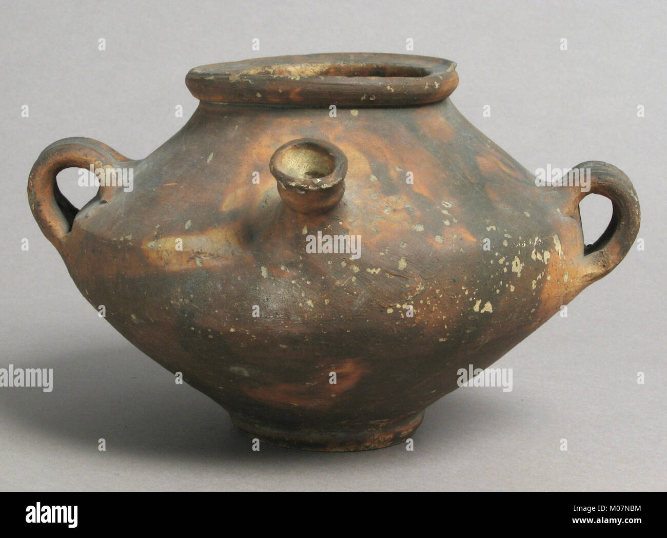 The jug, preserved in the MET collection, is an ancient ceramic vessel ...