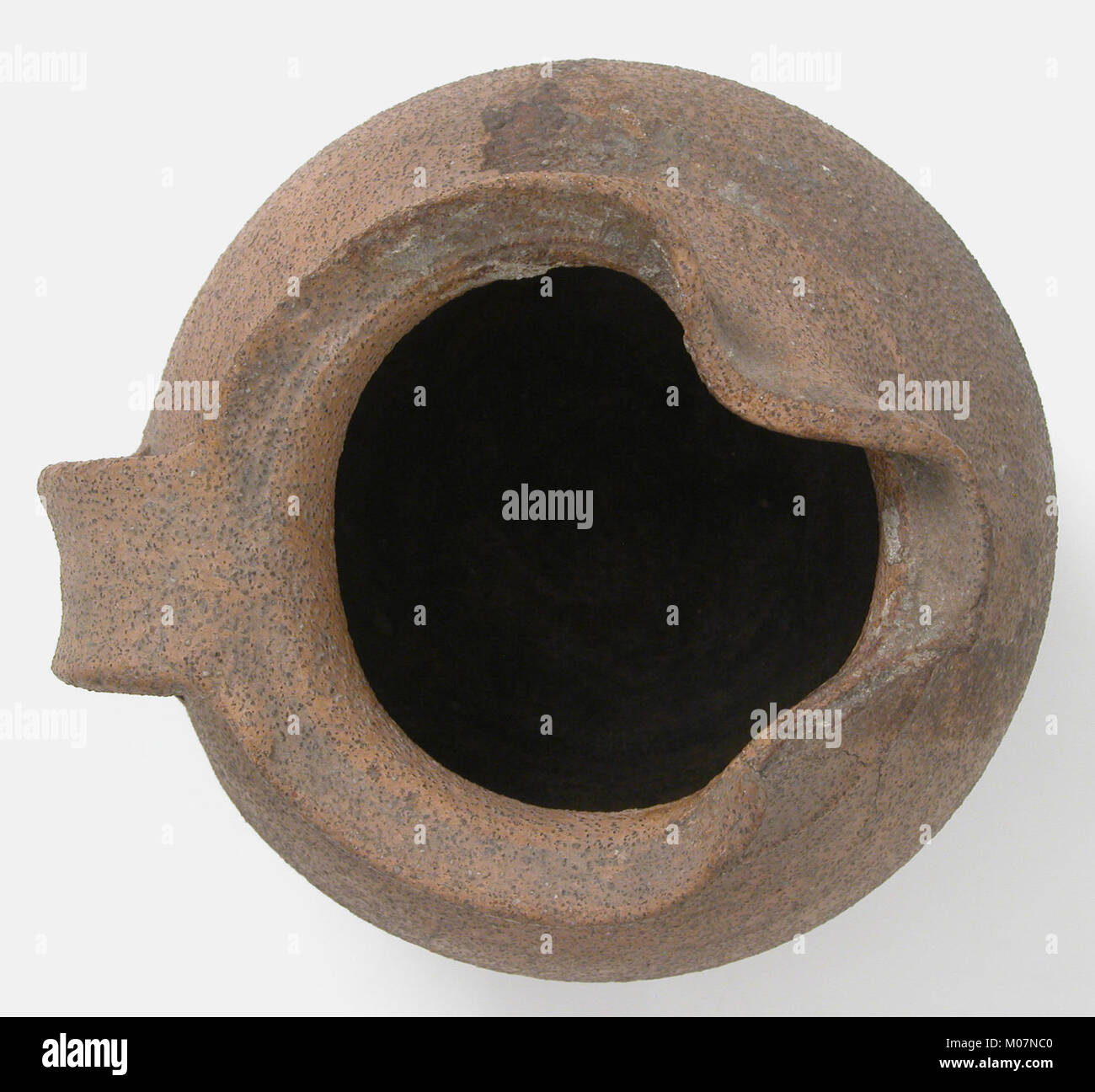 A jug, typically used for storing or pouring liquids. This example ...