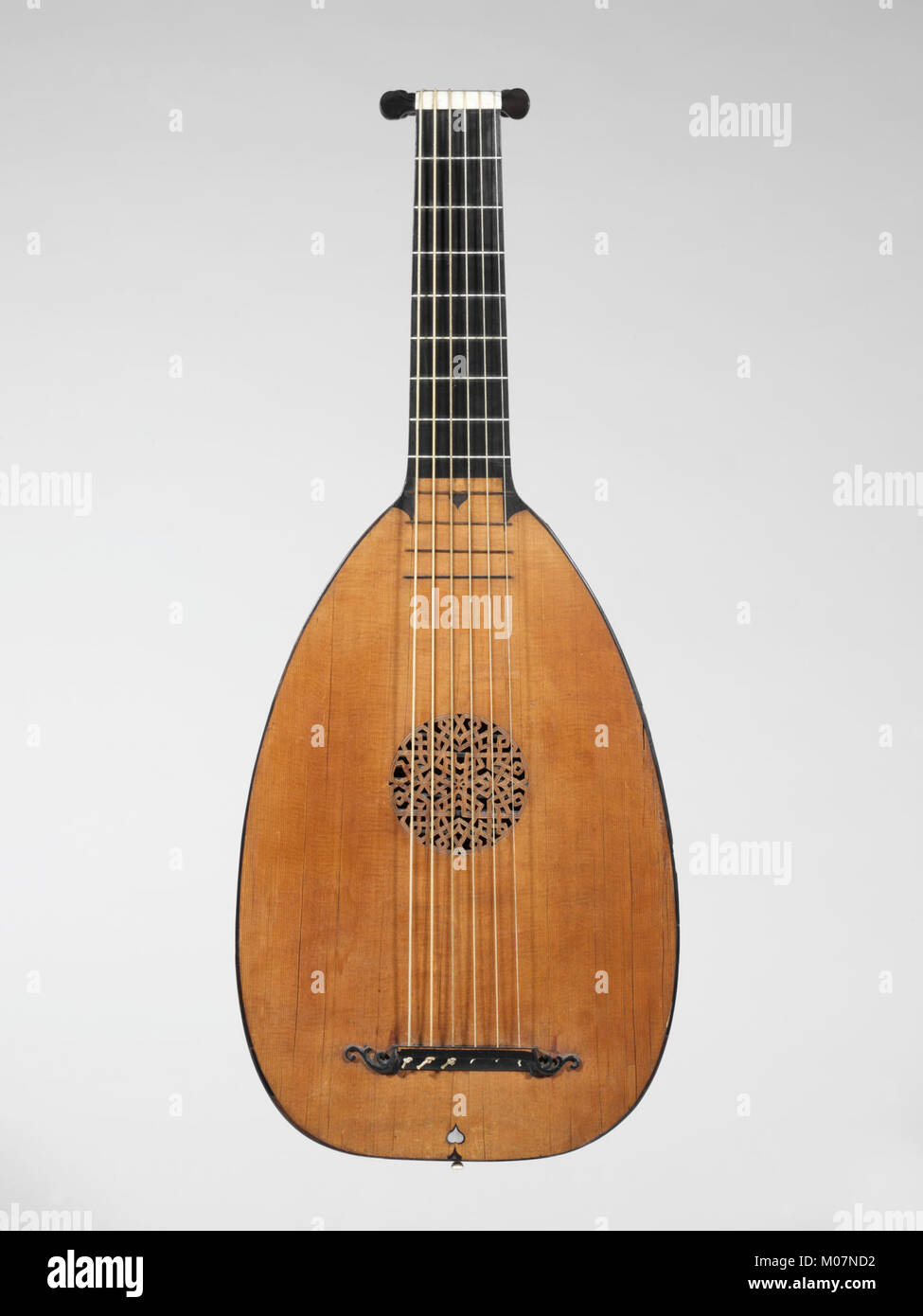 This lute from the MET collection represents a stringed instrument from ...