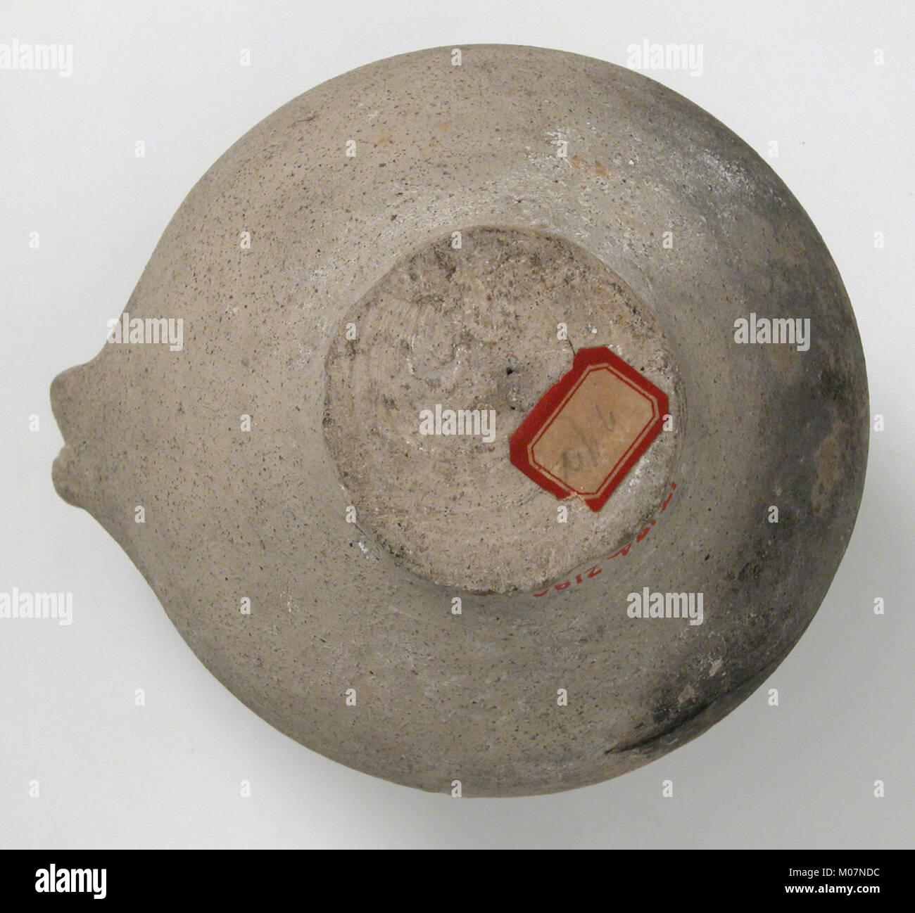 This jug is a preserved example of ancient ceramic work, with a ...