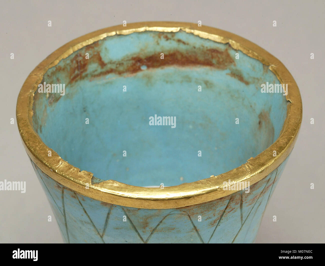 This lotiform chalice, with its distinct shape and ornate design ...