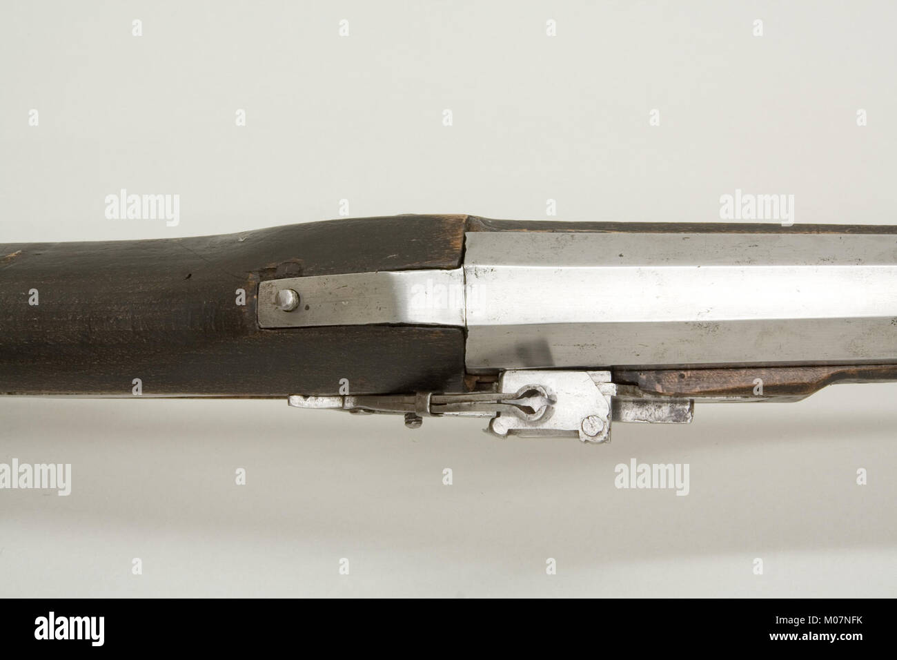 This matchlock gun, used in early firearms, represents an important ...