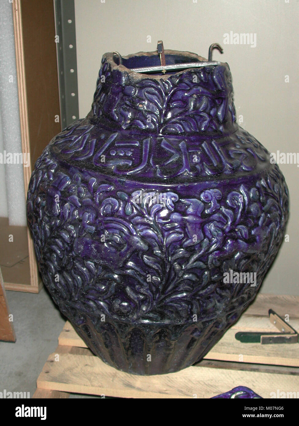 This large jar, made from ceramic material, displays traditional design ...