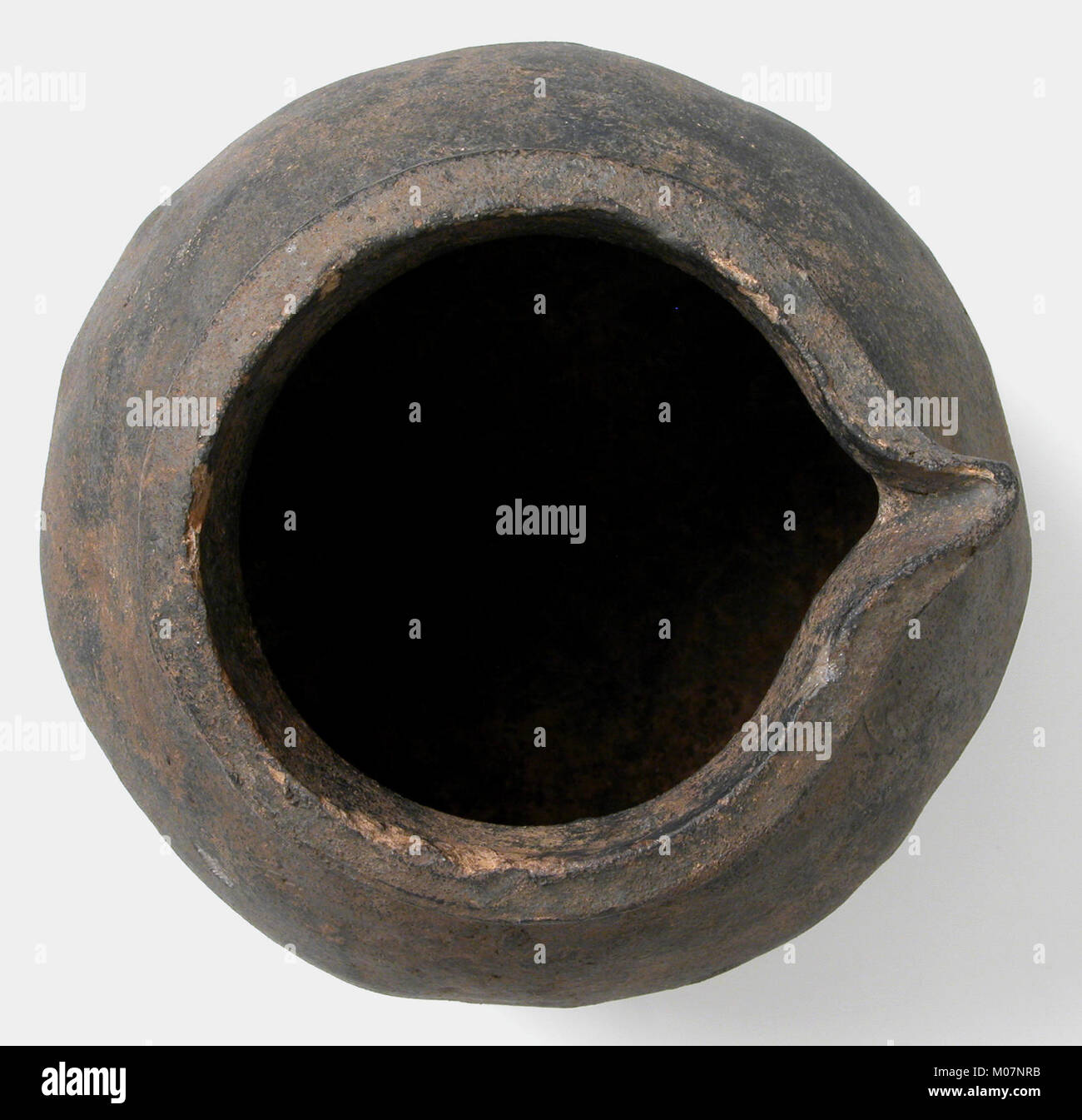 This jug is an example of ancient ceramic craftsmanship. Its form and ...