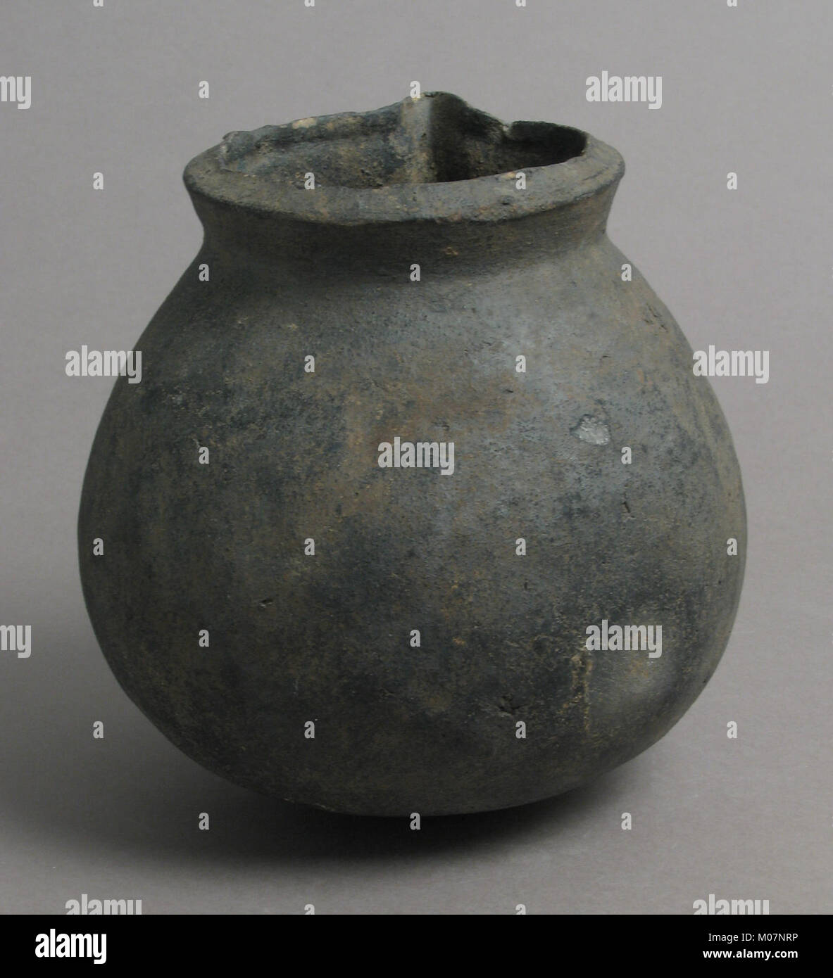 This jug is a well-preserved example of functional pottery, showcasing ...