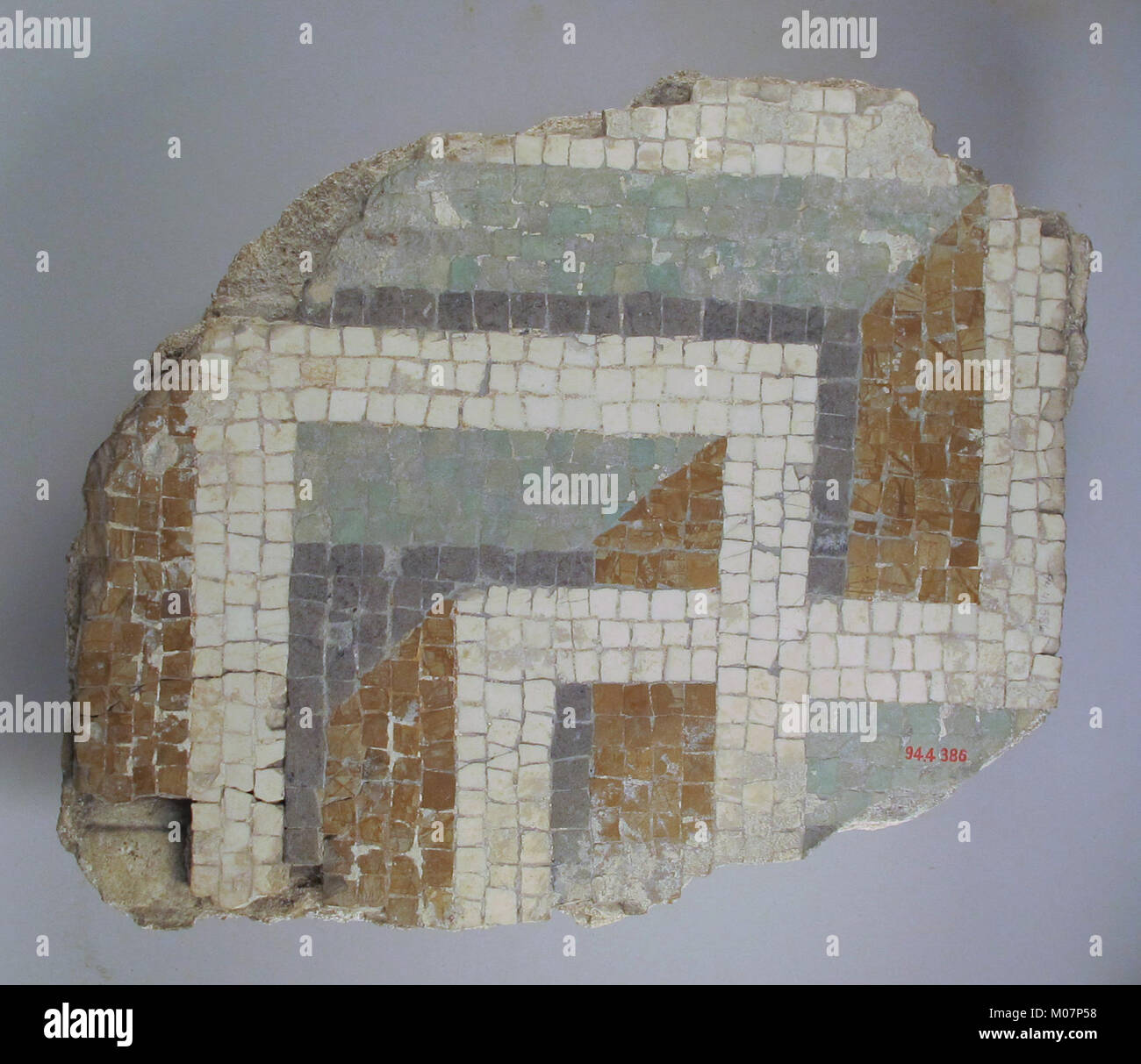 This mosaic floor fragment, likely from an ancient Roman villa or ...