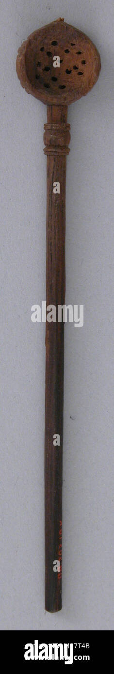 A kohl stick used for eyeliner, made from metal or bone, demonstrating ...