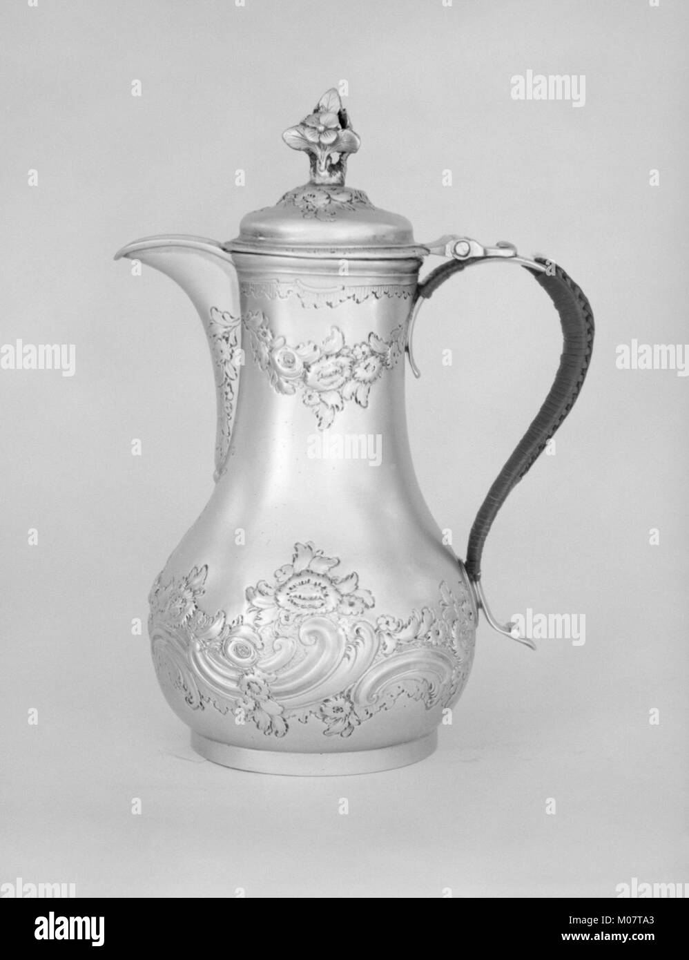 This hot water jug, made from durable materials, was designed for ...