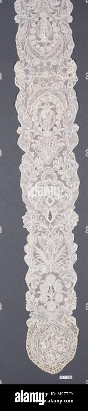 This lappet is a decorative textile feature used in historical garments ...