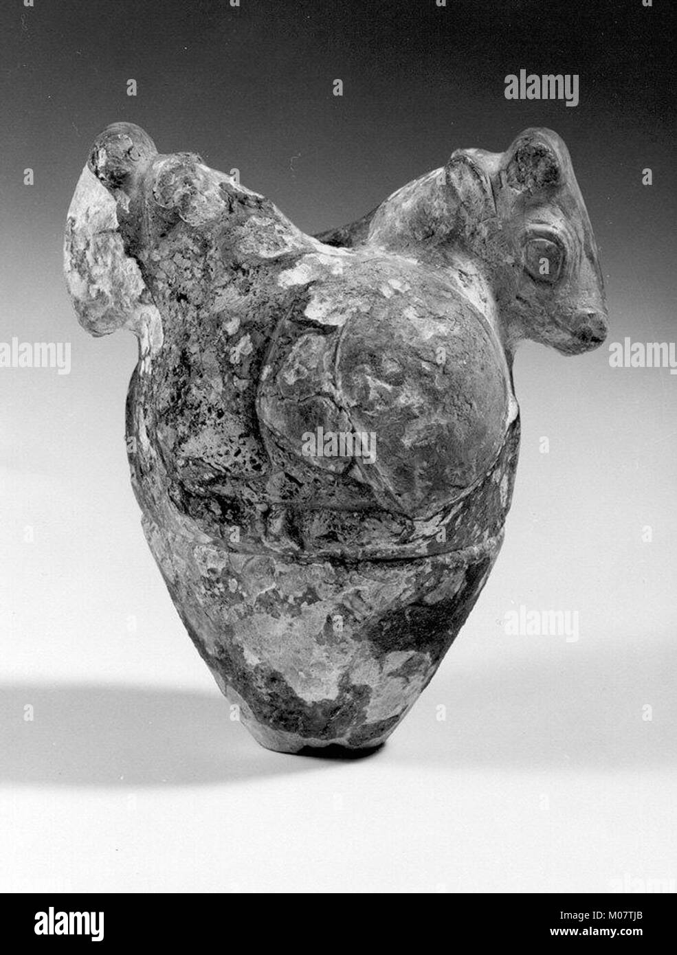 A mace head carved with reclining bulls demonstrates ancient ...