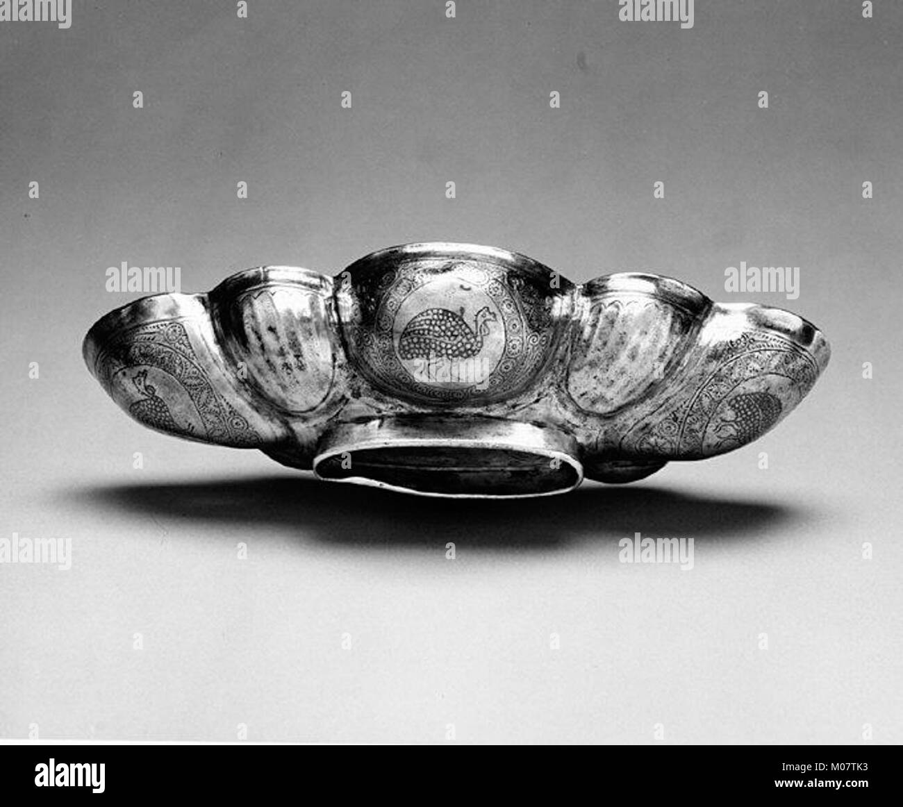 This lobed bowl features a unique, multi-lobed design typical of its ...