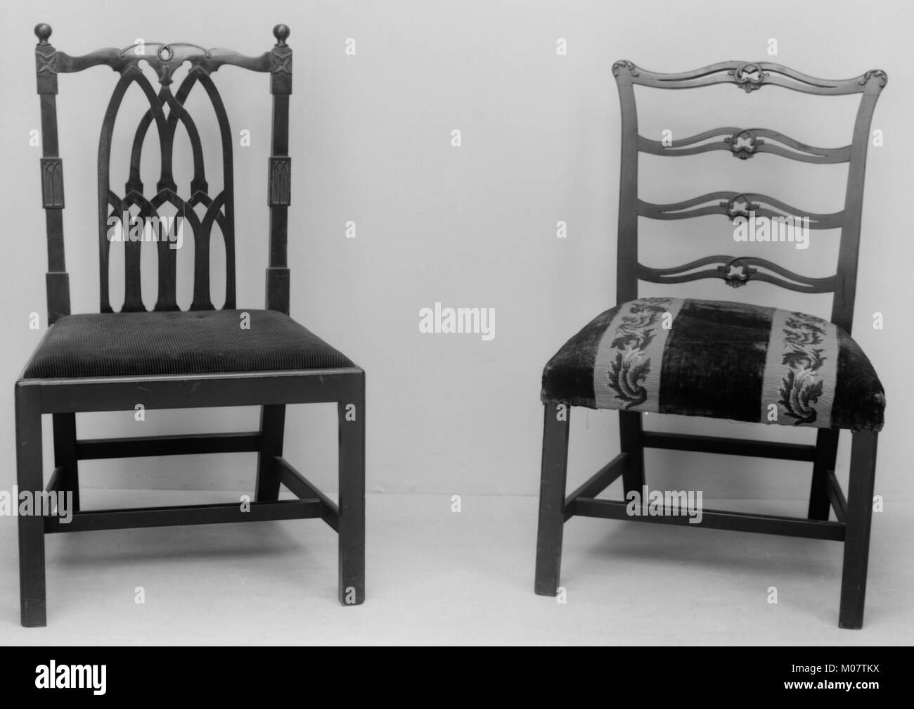 A ladder back chair, a traditional design known for its simple yet ...