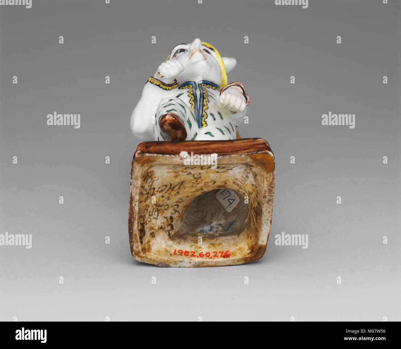 A sculpture of a hunchback, part of a pair, showcasing the artist's ...