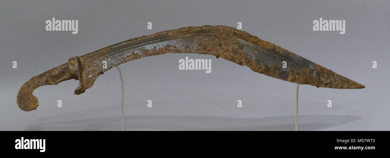 This iron machaira, a type of single-edged sword, showcases the ...