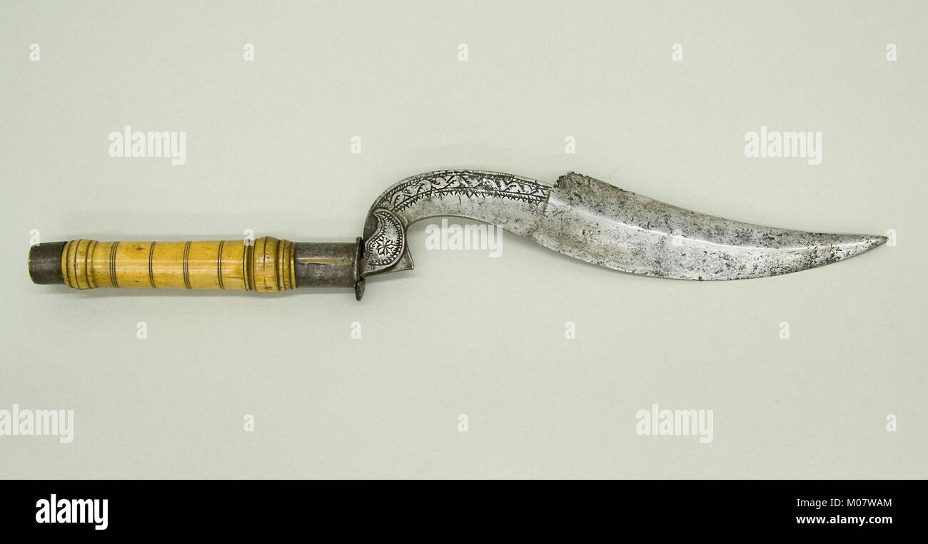 This chopper knife features a heavy blade, designed for chopping ...