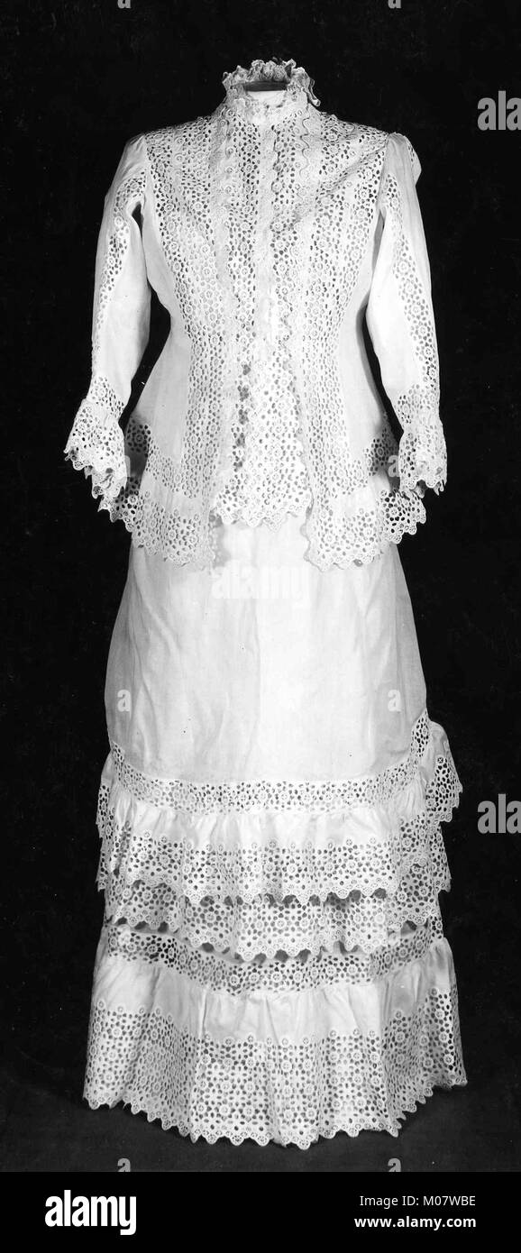 This front view of a morning dress showcases the style and design ...
