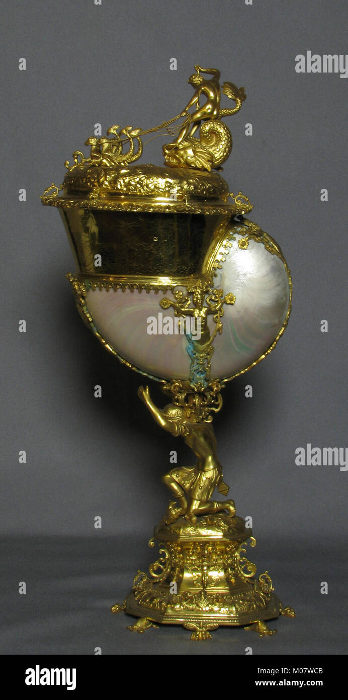 This Nautilus shell cup with a cover is a decorative object showcasing ...
