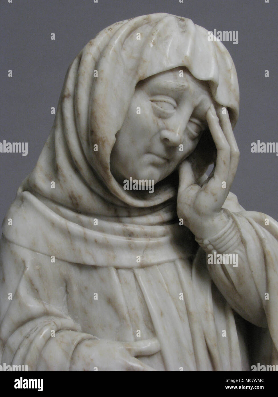 This artwork portrays a mourner, capturing the emotional depth and ...