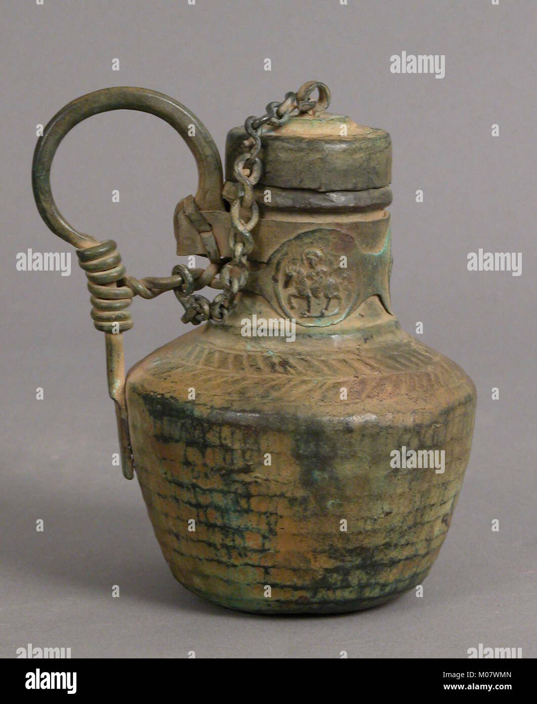 This jug features medallions as part of its design, representing both ...