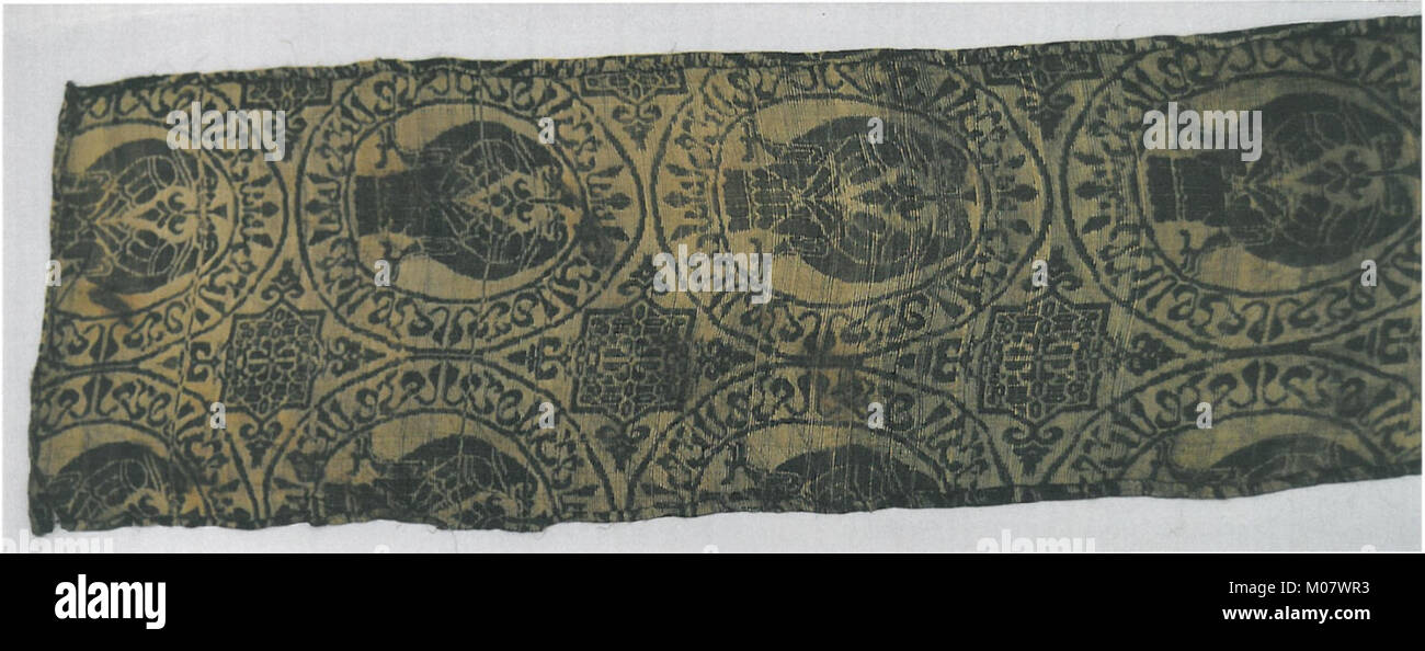 This lampas fragment and its case illustrate intricate textile ...