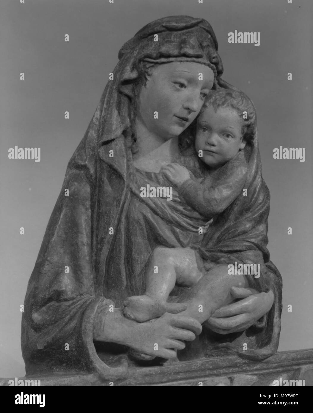 This artwork depicts the Madonna and Child, a common subject in Christian art. It reflects ...