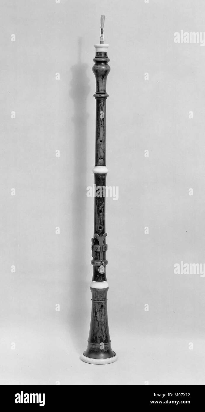 This oboe in C is a woodwind instrument crafted to produce a distinct ...