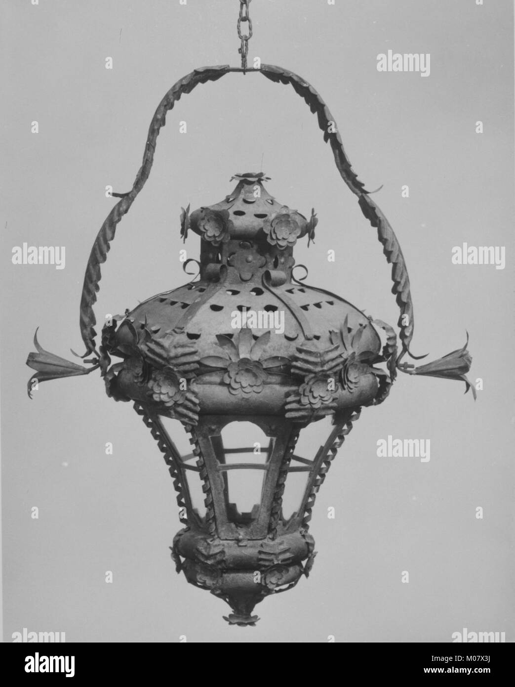 This lantern showcases intricate design and craftsmanship, reflecting ...