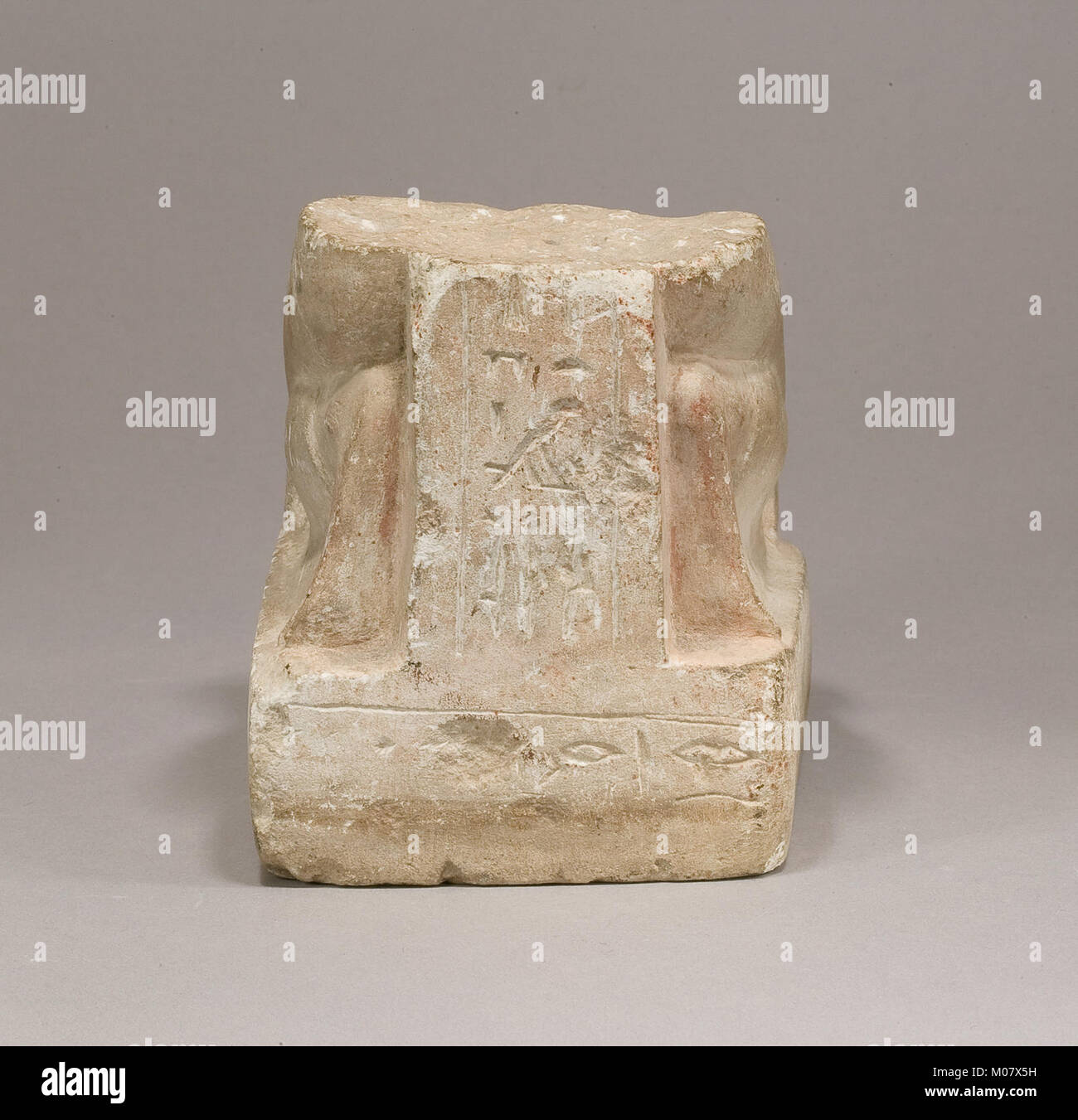 This lower half of a stelophorous statue provides a glimpse into ...