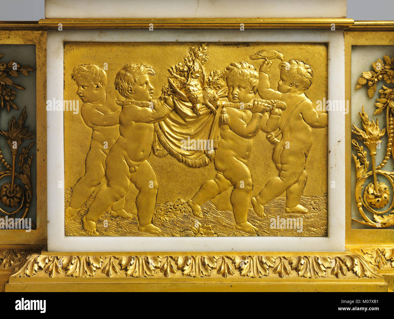 A mantel clock featuring an intricate musical movement. The clock ...