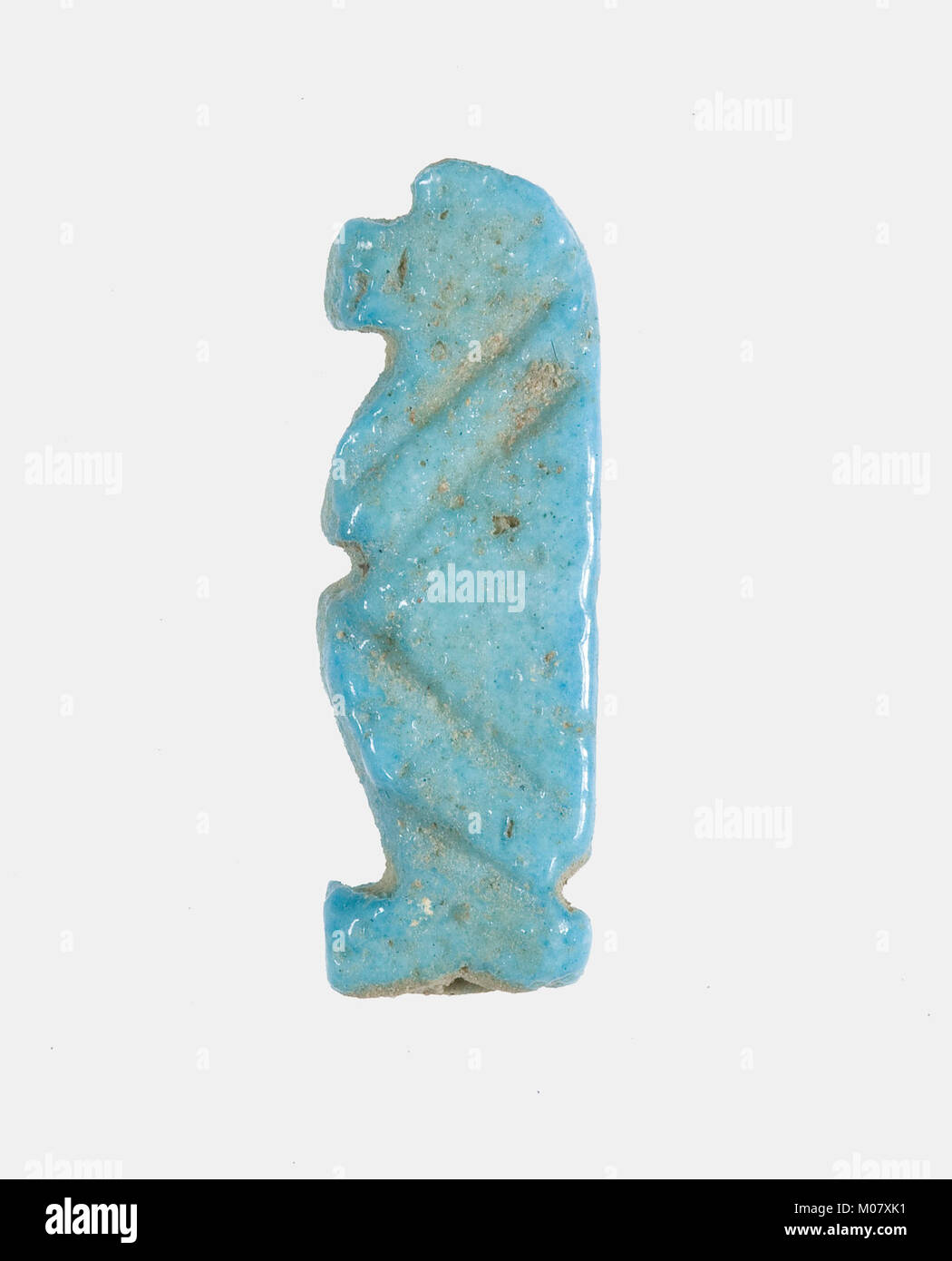 This monkey amulet serves as personal adornment, reflecting symbolic ...