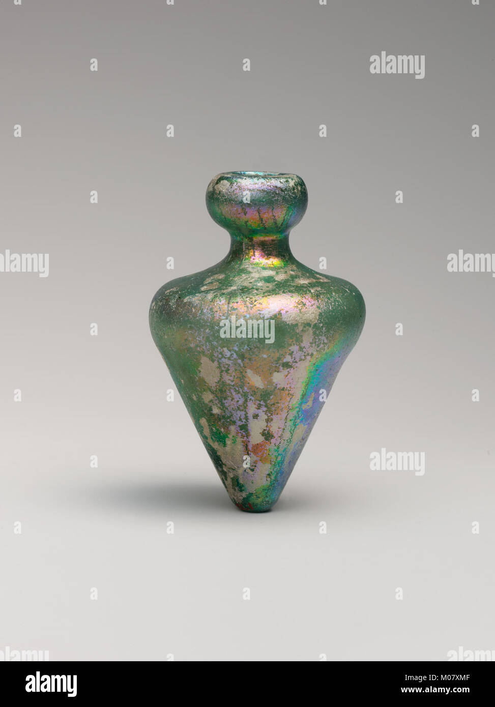 This object, a loom weight or vessel, is part of the MET collection. It ...