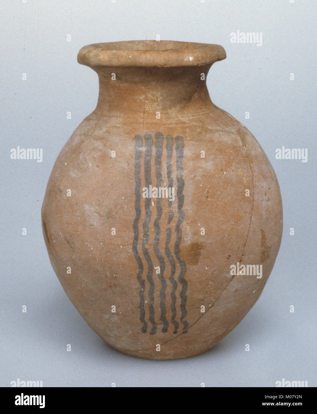This late ware jar features wavy painted decoration, a distinctive ...