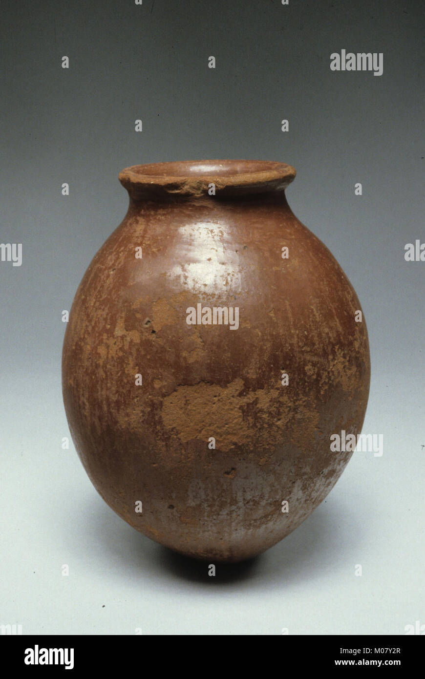 This jar, crafted from ceramic, showcases intricate design and ...