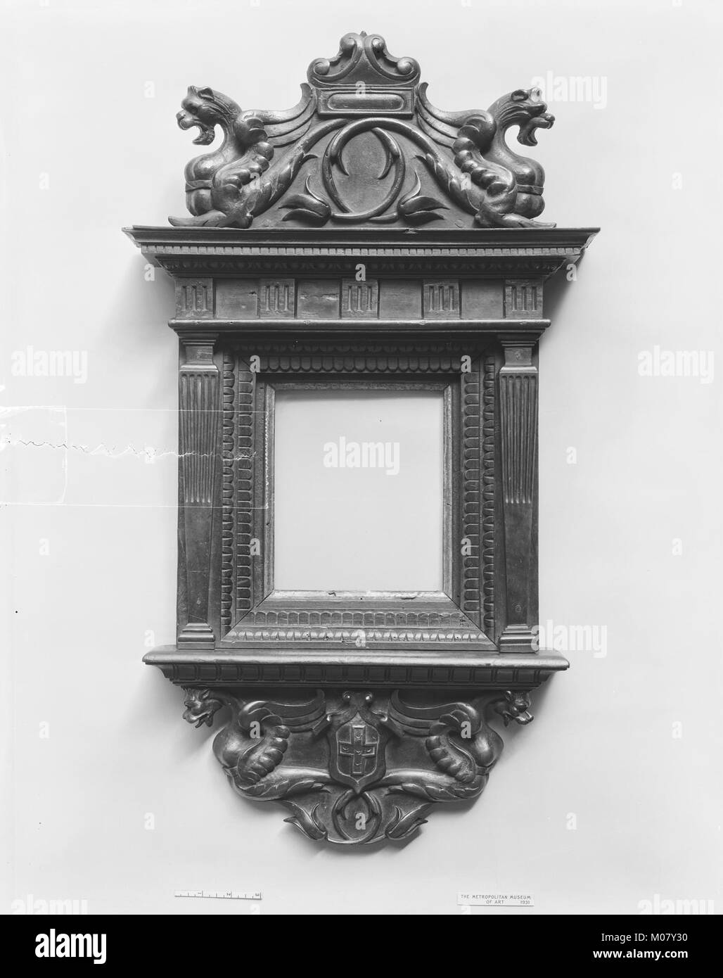 This mirror frame, MET 4444, is a decorative historical object ...