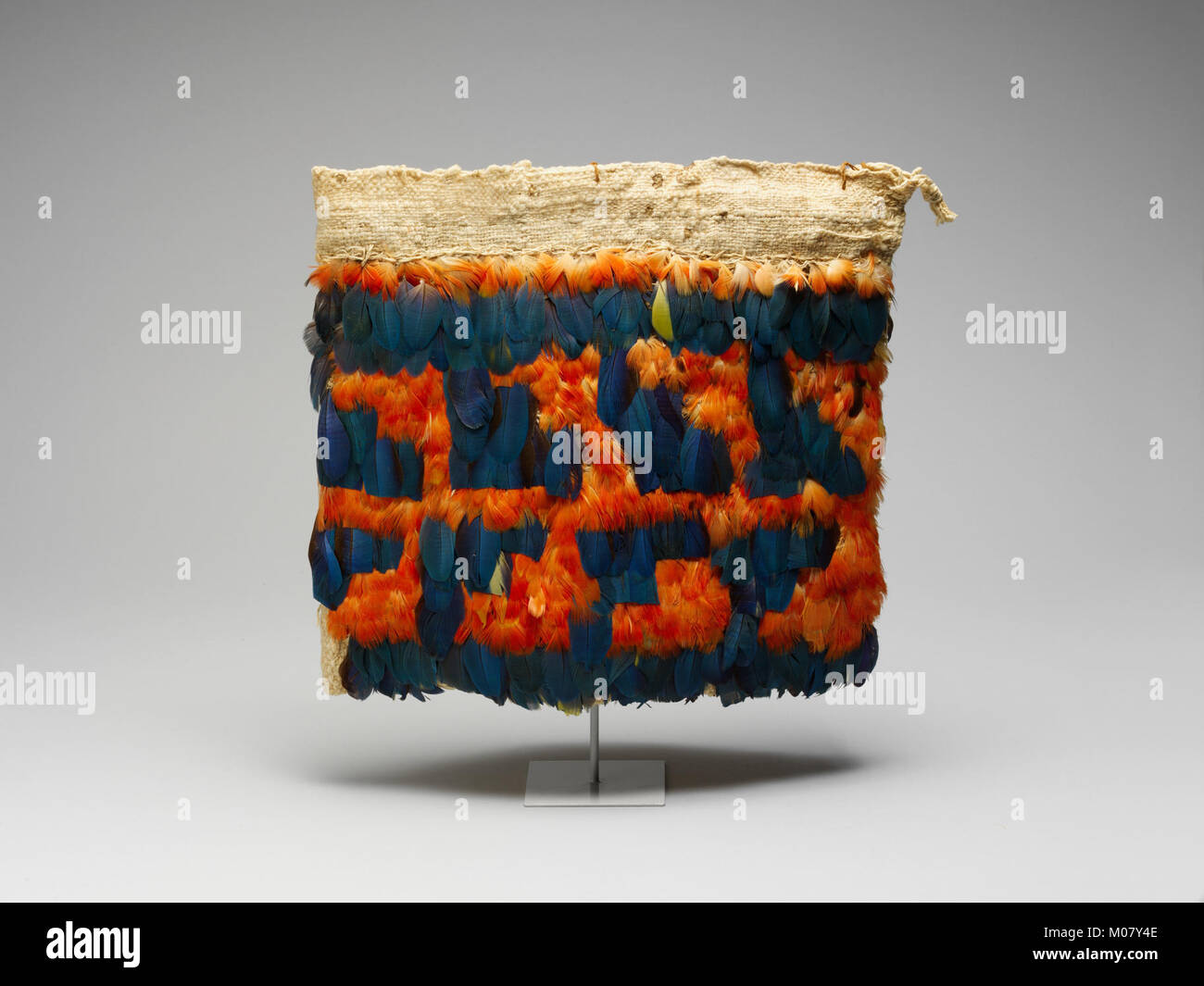 A miniature dress, a small-scale representation of fashion from a ...