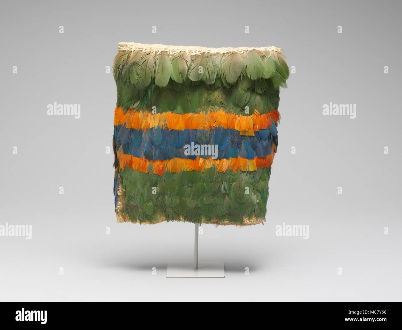 The miniature dress is a finely crafted textile piece, part of the MET ...