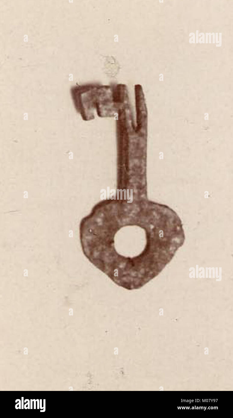This historical key, made from metal, is a functional artifact that ...