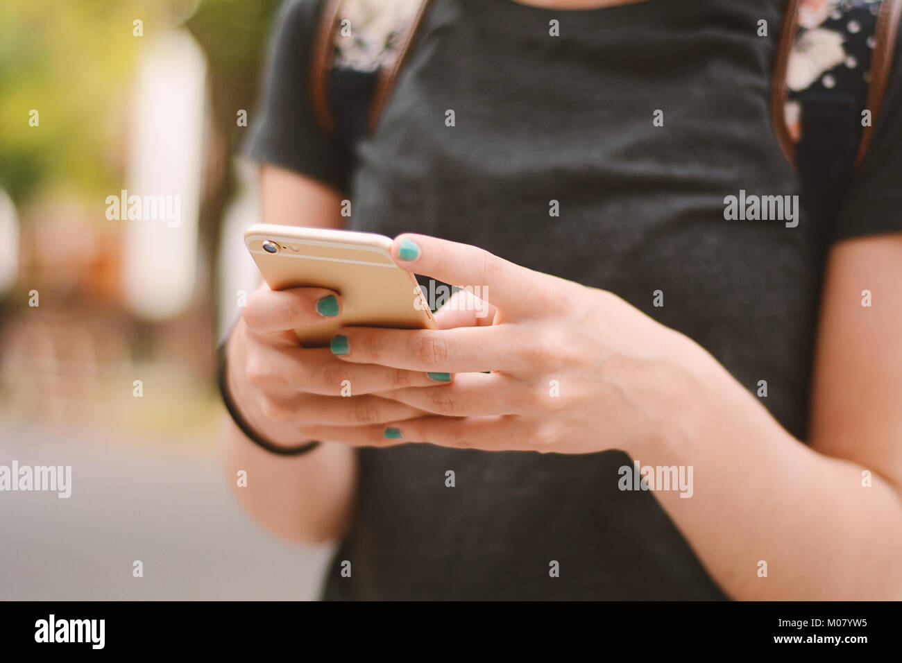 Close up of woman's hands texting with smartphone. Technology concept ...