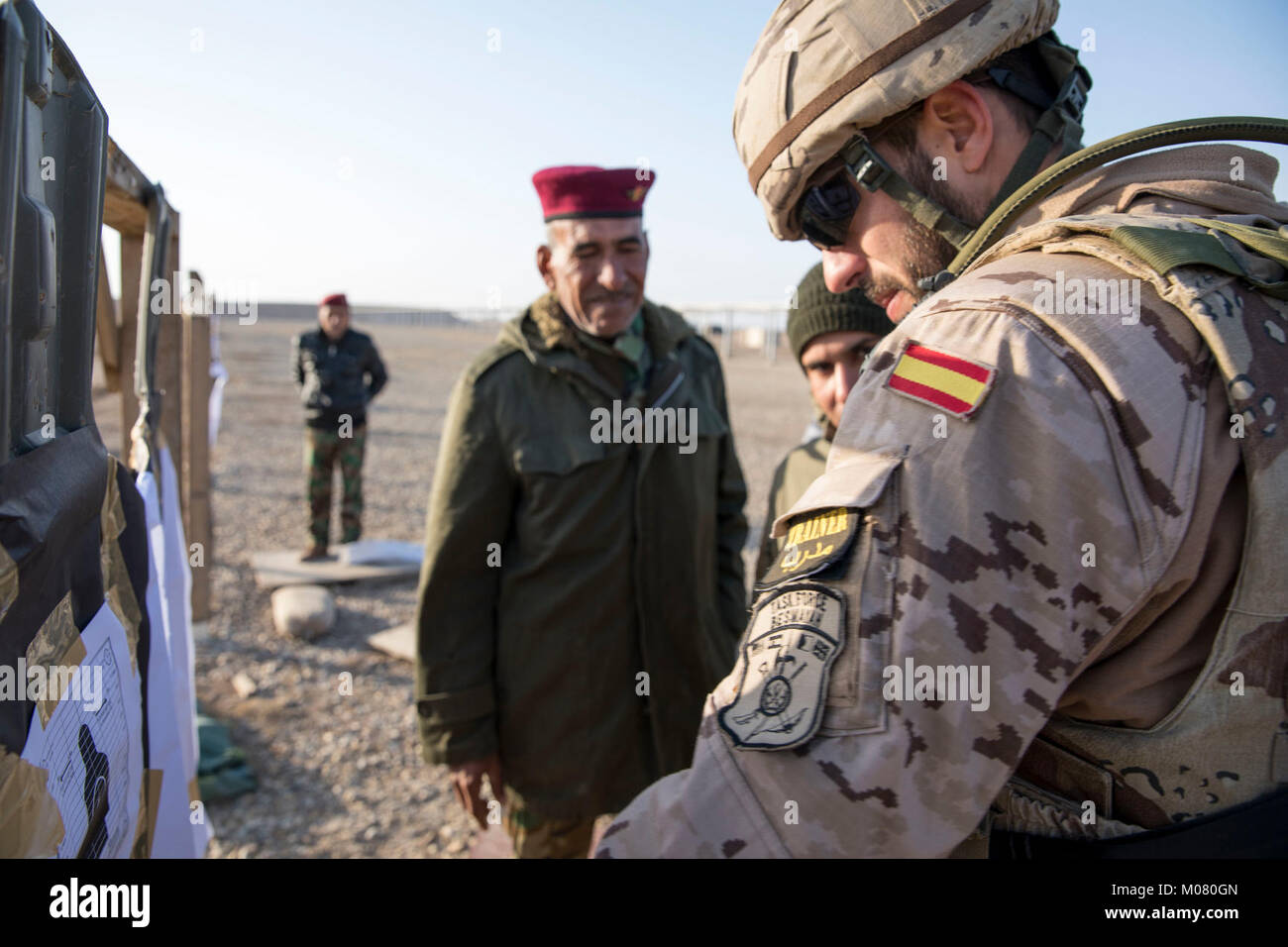 A Spanish Staff Sgt. assigned to La Legion Infantry, scans a target ...